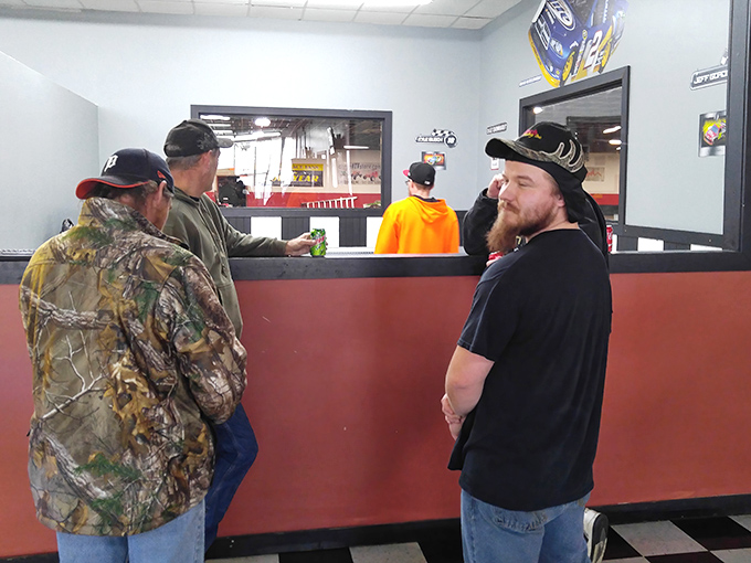 The registration counter where racing dreams begin, staffed by knowledgeable team members ready to get you on track.