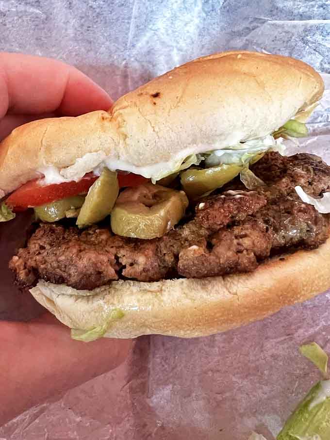 Deluxe olive burger: Michigan's beloved olive burger tradition lives deliciously at Clyde's, where briny green olives add unexpected zip to juicy beef.
