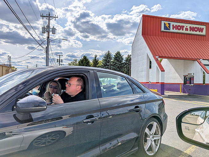 The drive-thru pilgrimage: where hungry travelers find salvation in the form of perfectly crafted fast food delivered with genuine Michigan warmth.