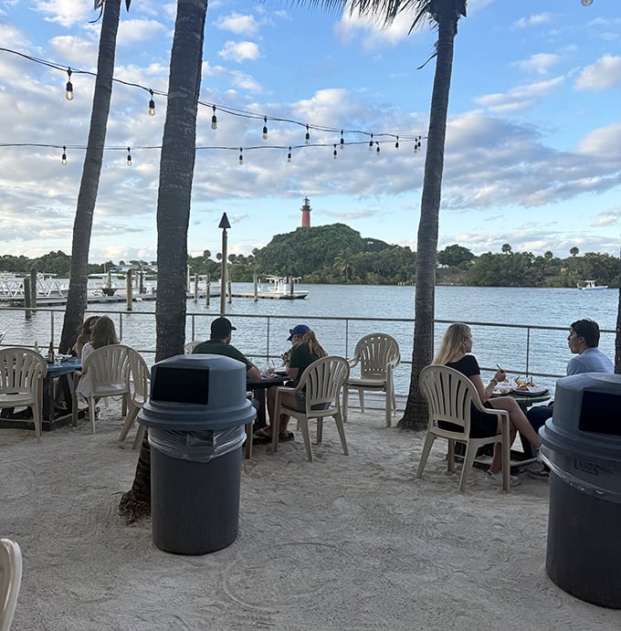 Sandy floors, water views, and happy diners &ndash; the Square Grouper's outdoor seating area is Florida living at its most authentic.
