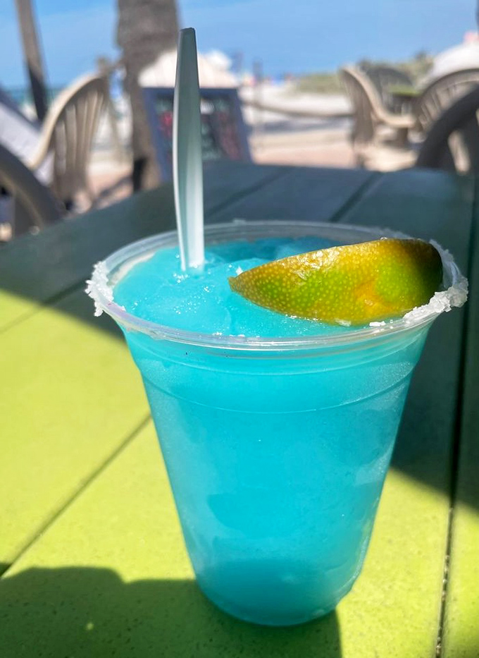 Electric relaxation: The Blue Margarita &ndash; where vacation meets glass in a color that matches the Gulf on its happiest day.