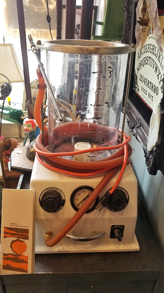 This vintage embalming machine looks suspiciously like someone attached medical tubing to their grandmother's pressure cooker and called it science.