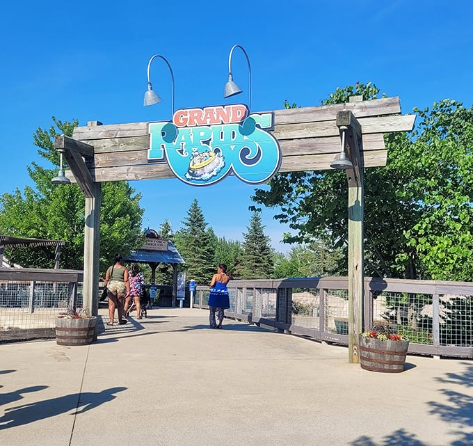 Grand Rapids entrance welcomes visitors with rustic charm and the promise of aquatic adventures waiting just beyond its wooden frame.