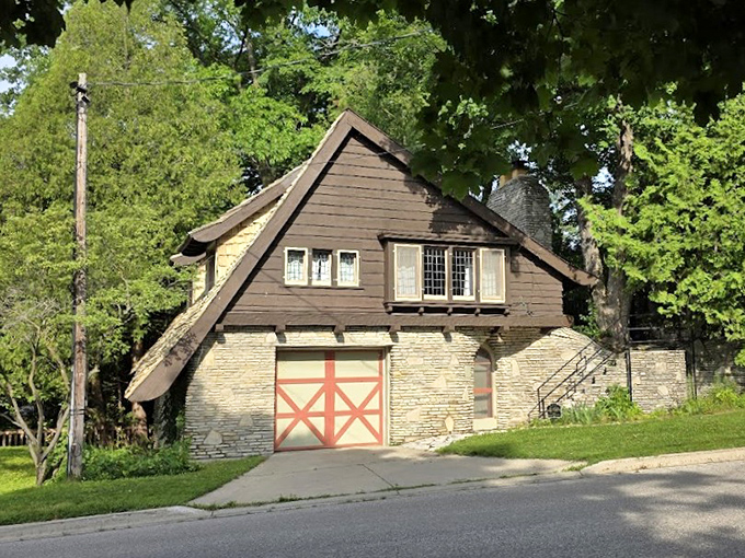 This aptly-named "Half House" showcases Young's playful approach, with its distinctive barn-inspired doors adding a touch of rural charm.