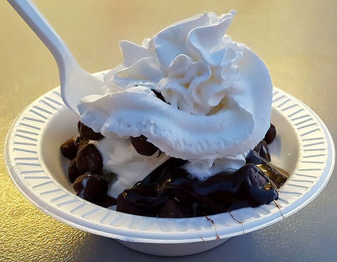 Hot fudge cascades through vanilla custard and brownie chunks &ndash; a dessert that demands to be eaten slowly and reverently.