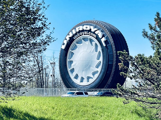 Spring brings a lush green backdrop to Michigan's most eye-catching roadside attraction, creating a surreal natural contrast.