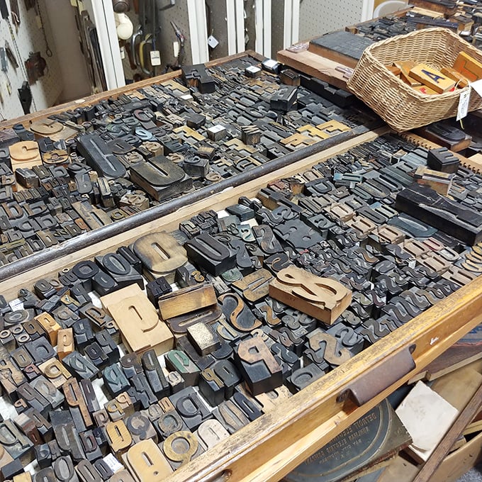 These letterpress printing blocks once created newspapers and advertisements by hand, each tiny metal letter a connection to communication's tactile past.
