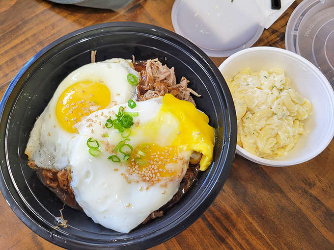Loco Moco: a hamburger patty, fried eggs, rice, and gravy walk into a bowl and create pure comfort food magic.