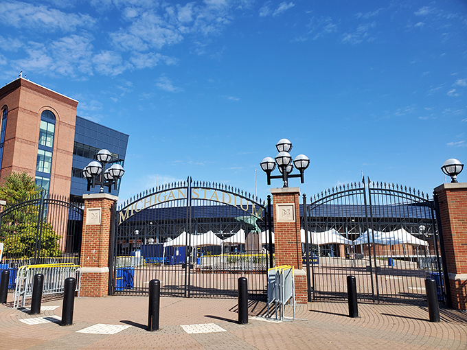 Michigan Stadium's imposing gates stand ready to welcome the 107,000+ faithful who transform this structure into the state's third-largest city on autumn Saturdays.