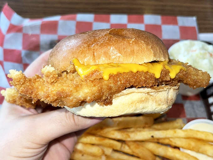 Golden-fried fish spilling over its bun&mdash;Mike's fish sandwich is the aquatic equivalent of a warm hug from a friend.