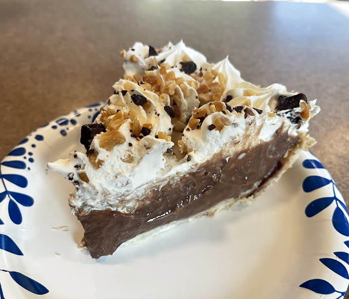 Homemade pie with mile-high meringue proves Schlenker's isn't just about the savory – their sweet offerings deserve equal acclaim.