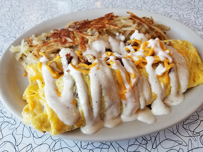 Ranch Bacon Omelet: an architectural marvel of folded eggs somehow containing a small grocery store's worth of fillings without structural failure.