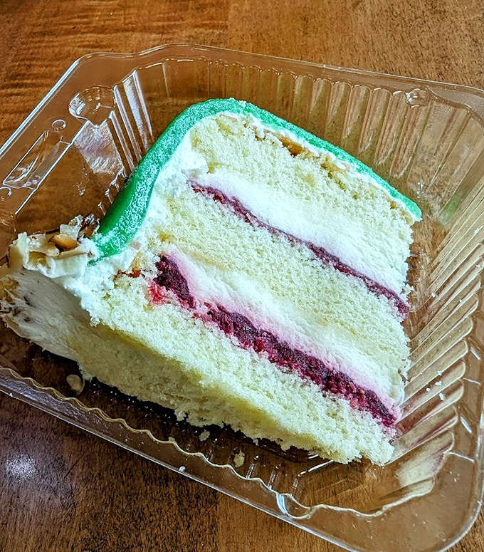 This slice of raspberry cream cake proves that sometimes the most beautiful things in life are meant to be devoured immediately.