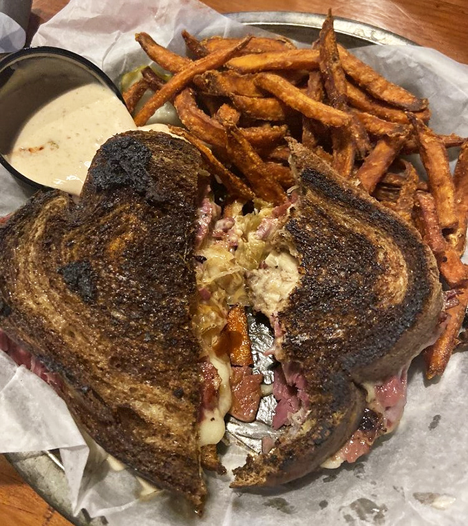 A perfectly grilled sandwich with sweet-smoky meat peeking out between toasted bread &ndash; comfort food elevated to art form.