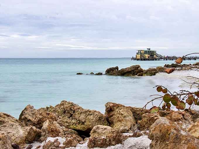 Rocky Shoreline: Where the Gulf meets the rocks &ndash; Bean Point's occasional rugged side offers a textured contrast to its powdery beaches.