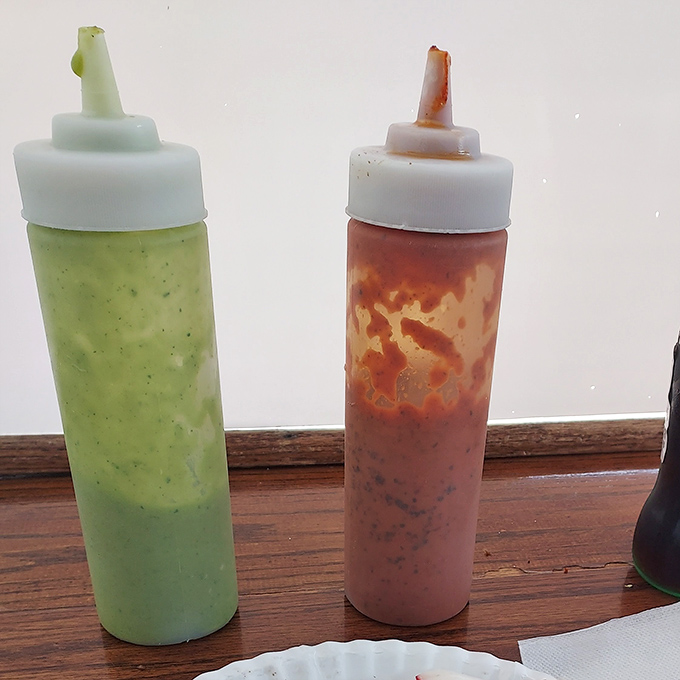 Those sauces! The green and red companions that elevate every bite from delicious to transcendent. Choose your adventure!