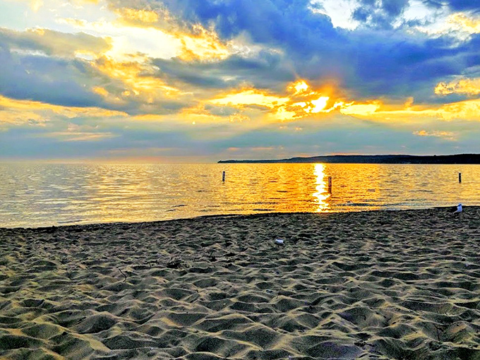 Golden hour transforms Petoskey's beach into something magical, when even the footprints in the sand tell stories of the day's adventures.