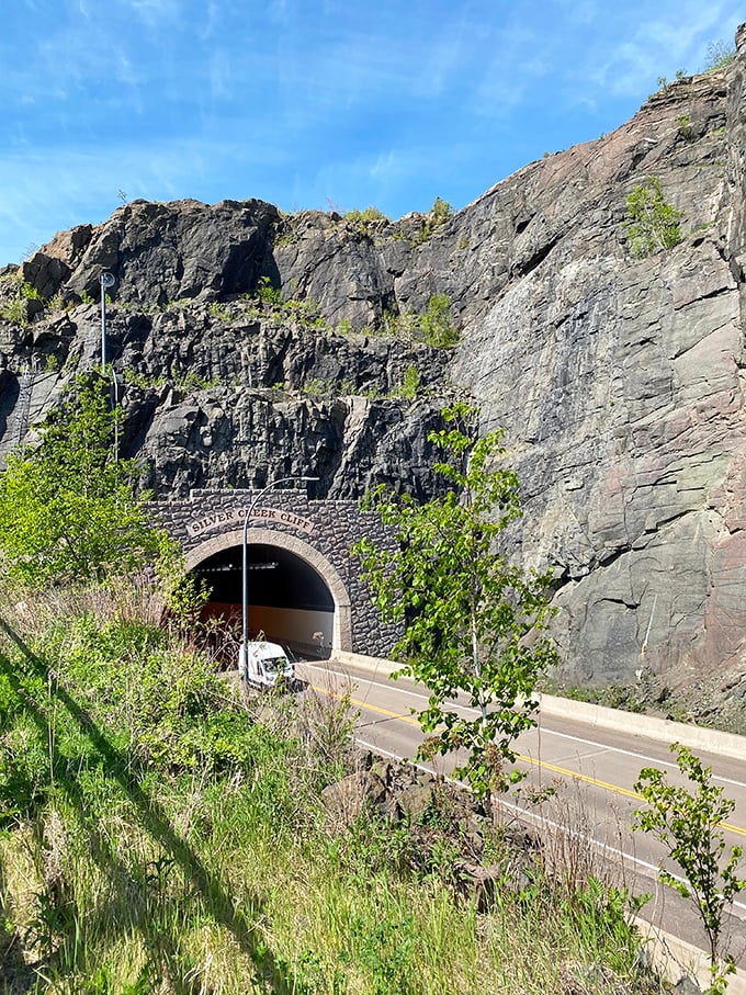 Silver Creek Cliff Tunnel carves through solid rock, a testament to human determination to follow Lake Superior's shoreline no matter what stood in the way.