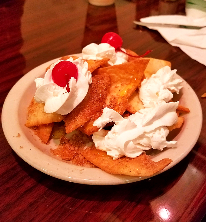 Crispy, honey-drizzled sopapillas crowned with whipped cream and cherries&mdash;the dessert that makes you reconsider your relationship with fried dough.