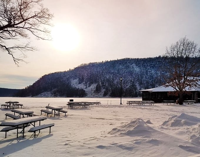 Winter transforms Devil's Lake into a snow-globe wonderland, where silence is broken only by the crunch of snowshoes on fresh powder.