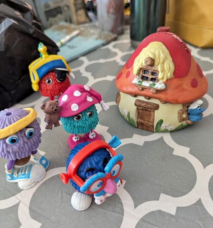 These quirky characters look like they're having a secret meeting to discuss their adventures after the humans leave the store.