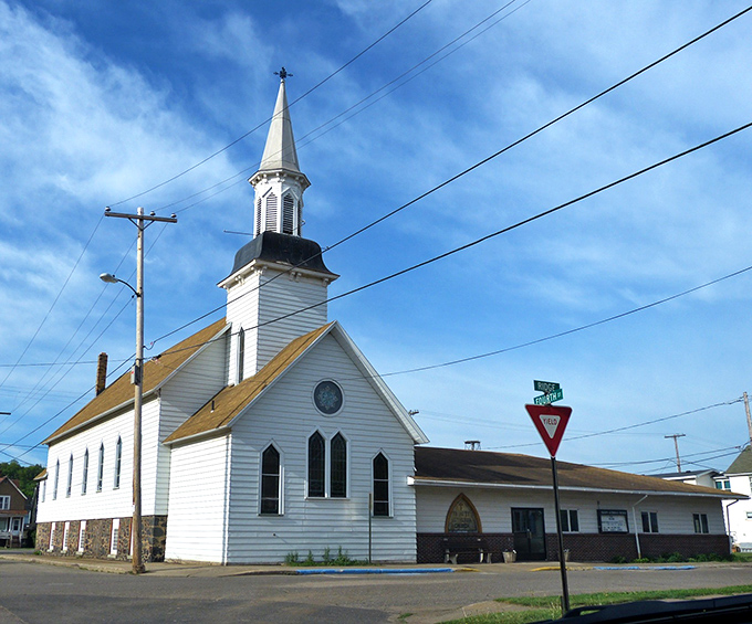 This classic white steeple has called the faithful to worship for generations, standing as a beacon of community.