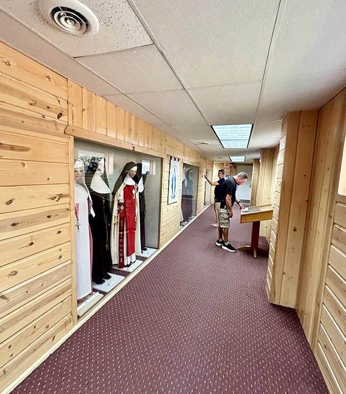 Wood-paneled corridors house glass-fronted displays where tiny nuns in various habits create a surprisingly captivating historical exhibit.