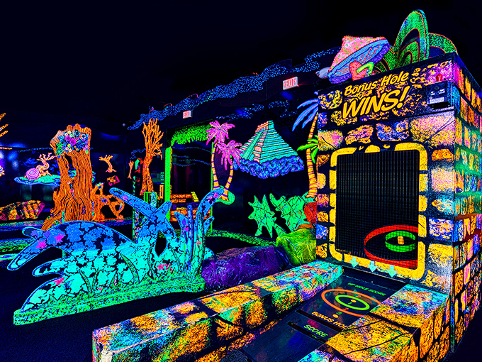 "Bonus Hole Wins!" promises the sign, as if the real prize isn't already the psychedelic journey your eyeballs are experiencing.