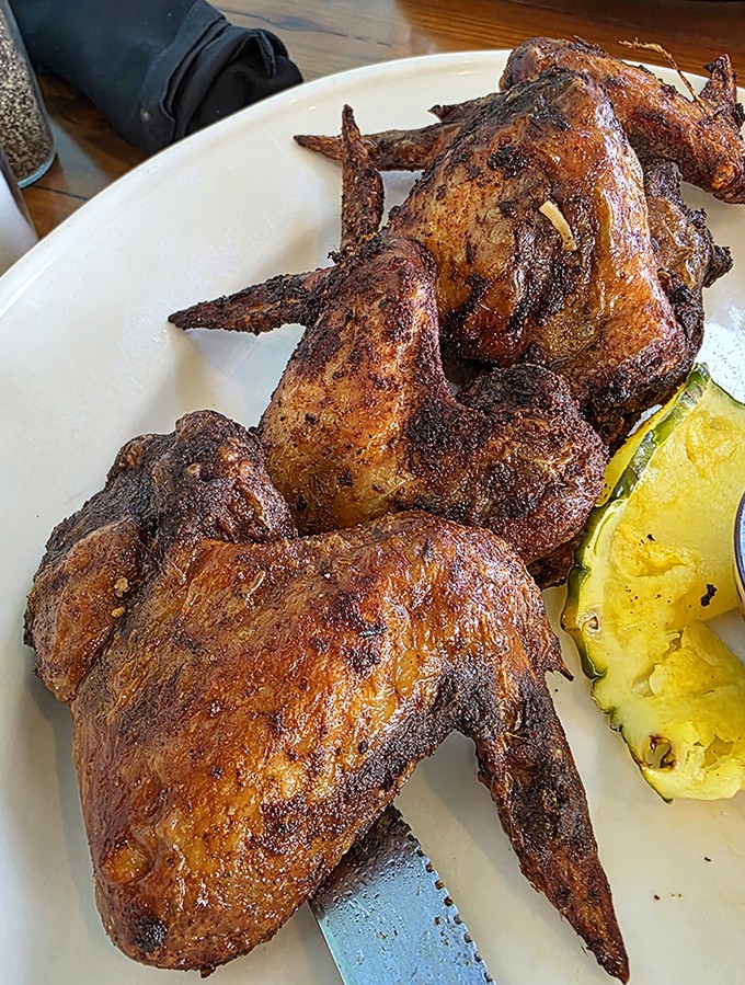 These aren't just wings – they're flavor ambassadors from Jamaica that make ordinary buffalo wings seem like they're not even trying.