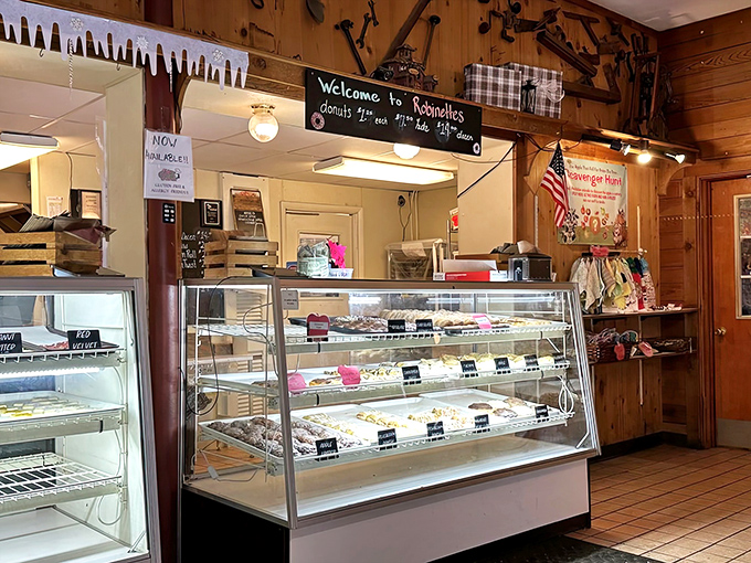 The display case is basically a museum of temptation, showcasing treats that make willpower seem like an outdated concept nobody needs anymore.