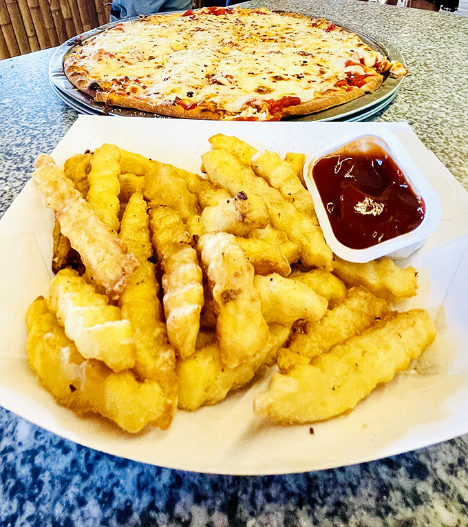 Golden fries and thin-crust pizza &ndash; Ka'Tiki's kitchen knows that beach hunger demands satisfying comfort food done right.