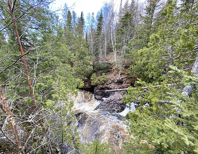 Spring meltwater rushes through ancient channels, a reminder of nature's raw power sculpting the landscape over millennia.