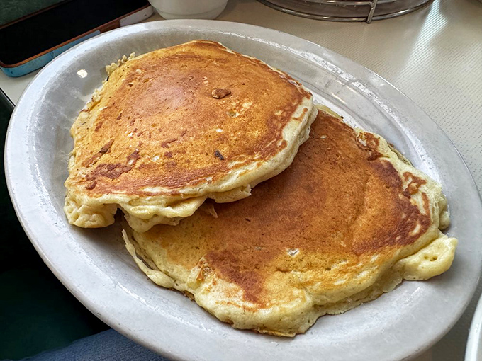 Pancakes: Fluffy golden discs of breakfast perfection that make you question why you'd ever settle for cereal on a weekend morning.