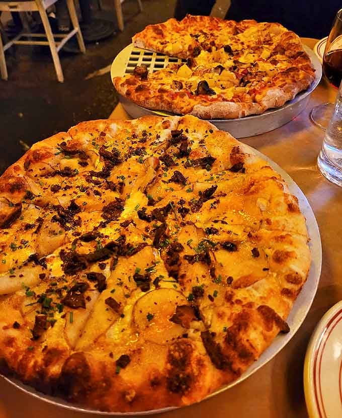 Pizza: Coal-fired perfection with crusts that whisper "bite me" &ndash; these artisanal pies make you question why you ever settled for delivery pizza in the first place.