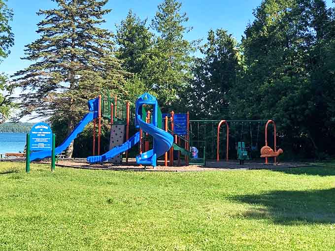 Even the playground offers million-dollar views at Torch Lake, where kids build sandcastles with one eye on the mesmerizing blue beyond.