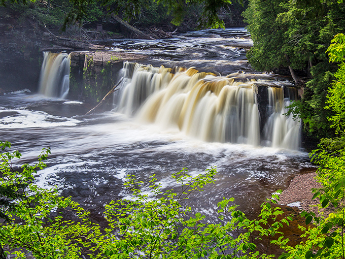 Nature in frames the cascading waters, creating a color palette that would make even the most accomplished artists question their skills.