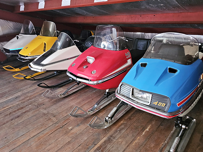Vintage snowmobiles in candy-colored perfection remind us that Wisconsin winters were made for motorized adventure.