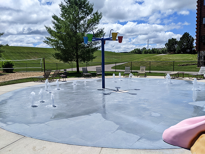 Simple joys sparkle brightest &ndash; dancing fountains in a splash pad where little feet can patter through cool waters under Michigan's summer sky.