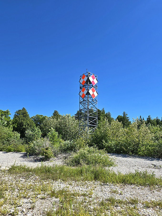 This colorful navigation tower stands like an exclamation point against the sky, guiding sailors safely home.
