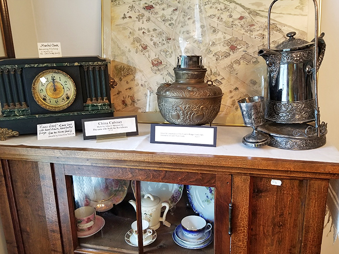 Elegant silver serving pieces and vintage timepieces showcase the finer things that even rural families treasured and passed down through generations.
