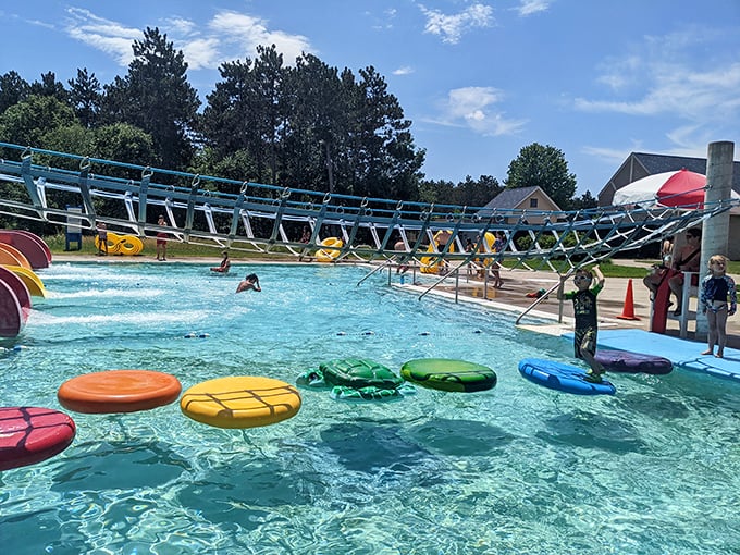 The rope bridge offers a wobbly passage across cool waters &ndash; a test of balance that usually ends with a refreshing splash.
