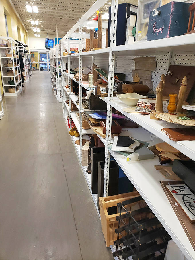 Wooden items and handcrafted treasures line the shelves, each piece carrying stories from its previous life while awaiting a new chapter.