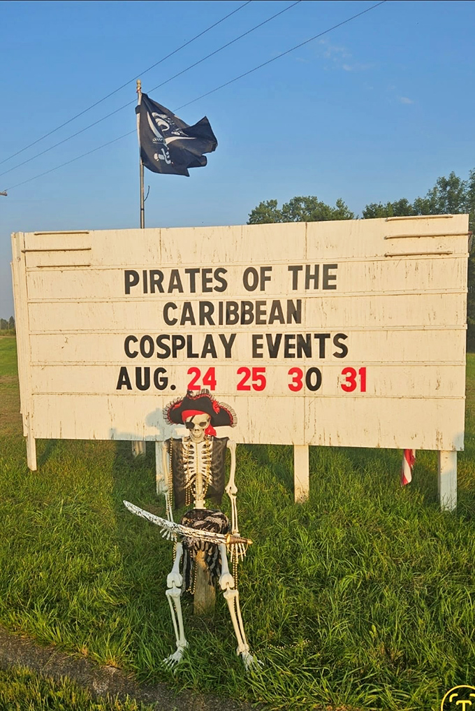A swashbuckling skeleton guards the upcoming schedule, welcoming guests to join in the fun of a themed cosplay event.