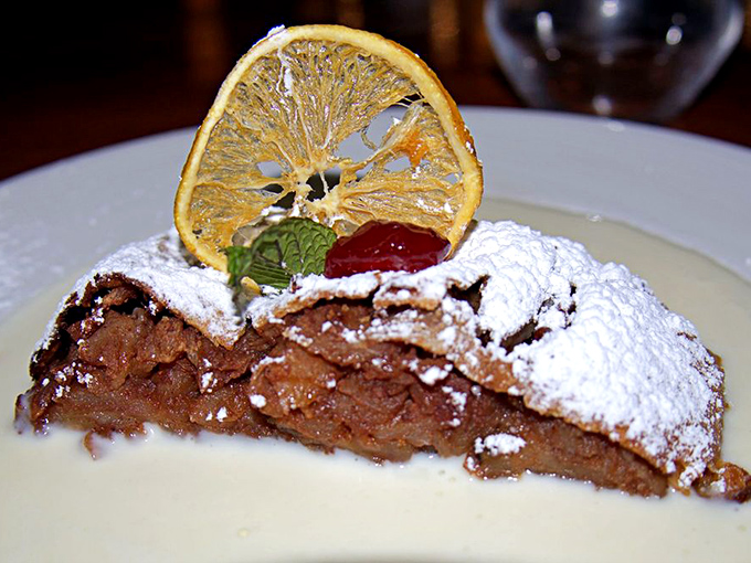 Apple strudel dusted with powdered sugar like the first perfect snowfall of winter &ndash; comfort food that somehow manages to feel sophisticated.