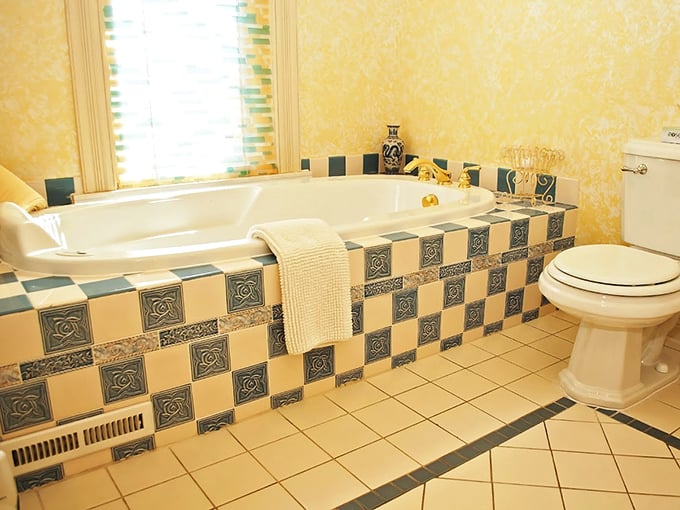Bathroom Whirlpool Tub: Checkerboard tiles and a spacious soaking tub transform ordinary bathing into a spa-like ritual worthy of Victorian royalty.