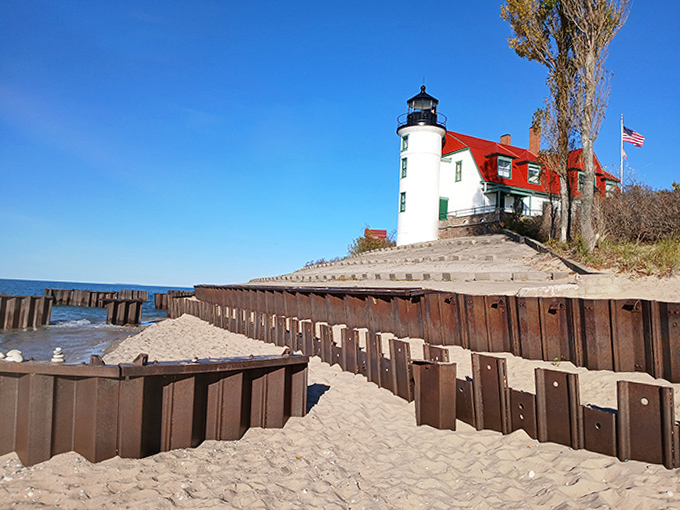 Wooden retaining walls fight a constant battle against Lake Michigan's erosive power, protecting this historic treasure.