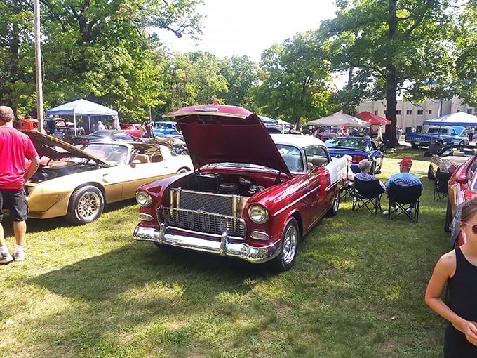 Classic cars line the castle grounds during special events, their vintage chrome gleaming against the backdrop of medieval-inspired architecture.