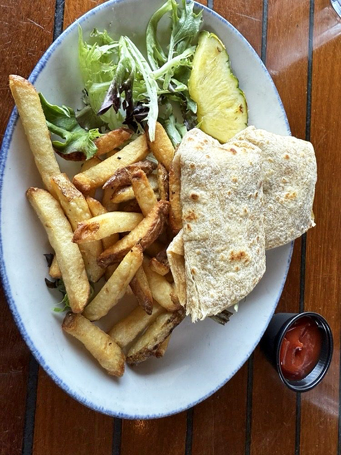 Fresh ingredients shine in this chicken wrap, where crisp vegetables and tender meat find perfect harmony in a portable package of lunchtime bliss.