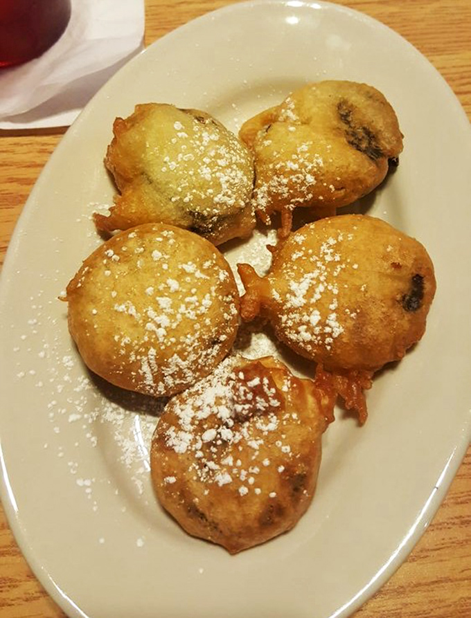 Deep-fried Oreos dusted with powdered sugar &ndash; where the cookie center transforms into warm, molten goodness that'll make you giggle with delight.