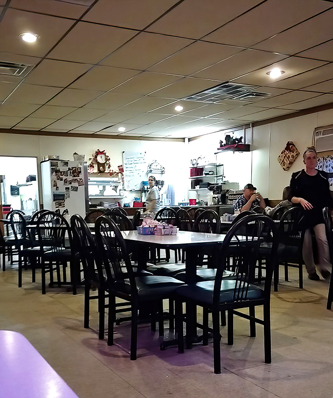 The dining area serves as Millington's unofficial town hall, where local news travels faster than the specials of the day.
